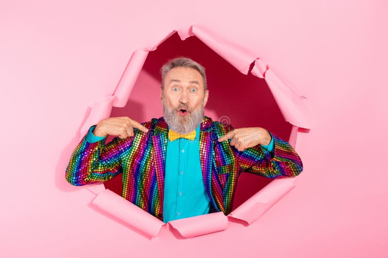 Eccentric Man in Colorful Sequin Suit Poses Against a Pink Background ...