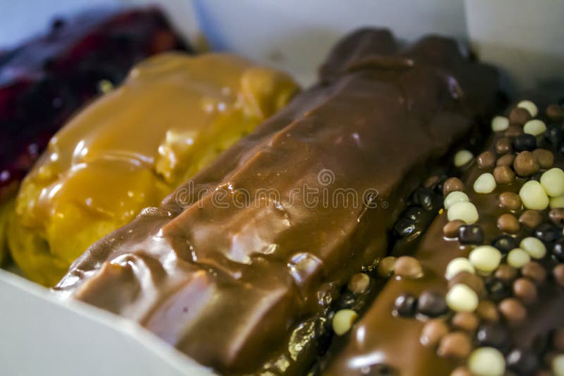 Eclair Cakes with Different Topping Stock Photo - Image of cuisine ...
