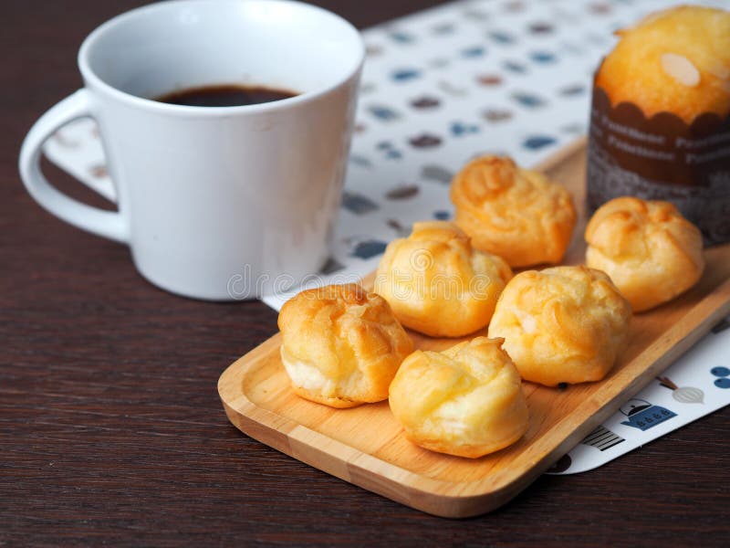 Eclair and coffee stock photo. Image of tasty, dessert - 74240004