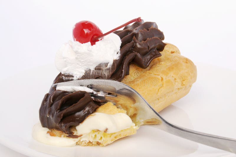 Eclair Cream puff stock image. Image of cream, dessert - 11517759