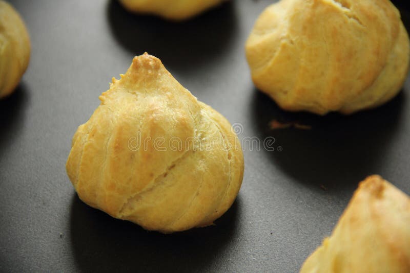 Eclair or profiterole stock photo. Image of eclaire, isolated - 83954866