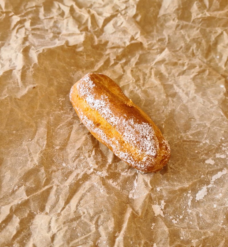 One eclair stock image. Image of eclairs, snack, sugar - 218944381