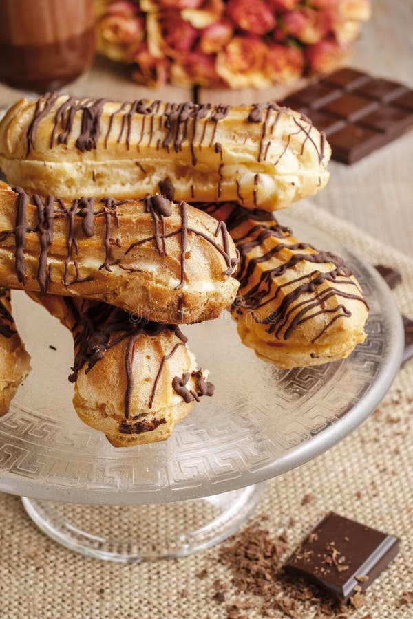 Eclairs stock image. Image of baked, frosting, brown - 53298449