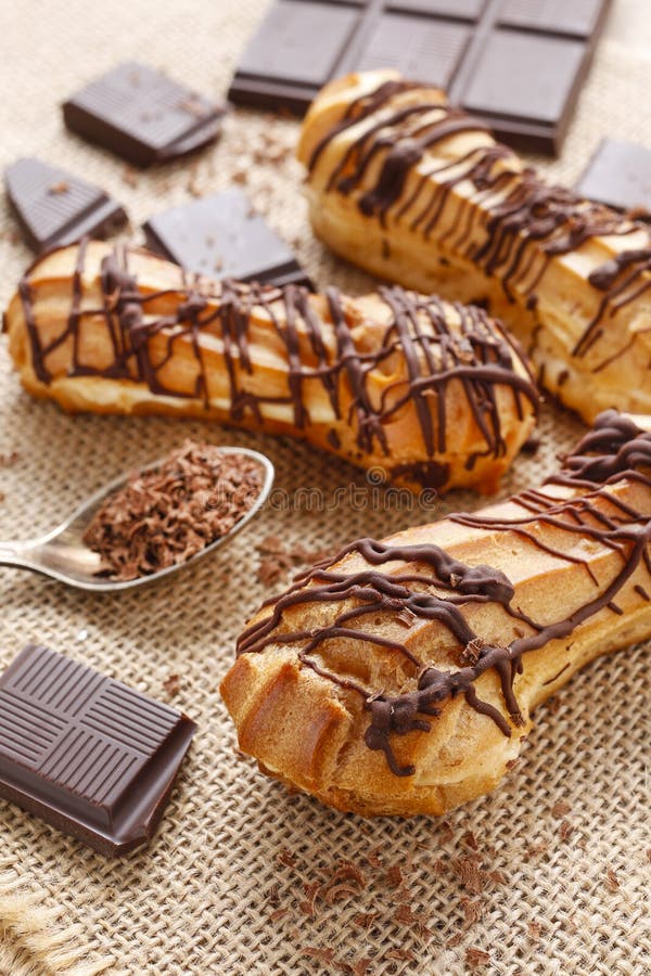 Eclairs with chocolate stock photo. Image of cream, dessert - 46204514