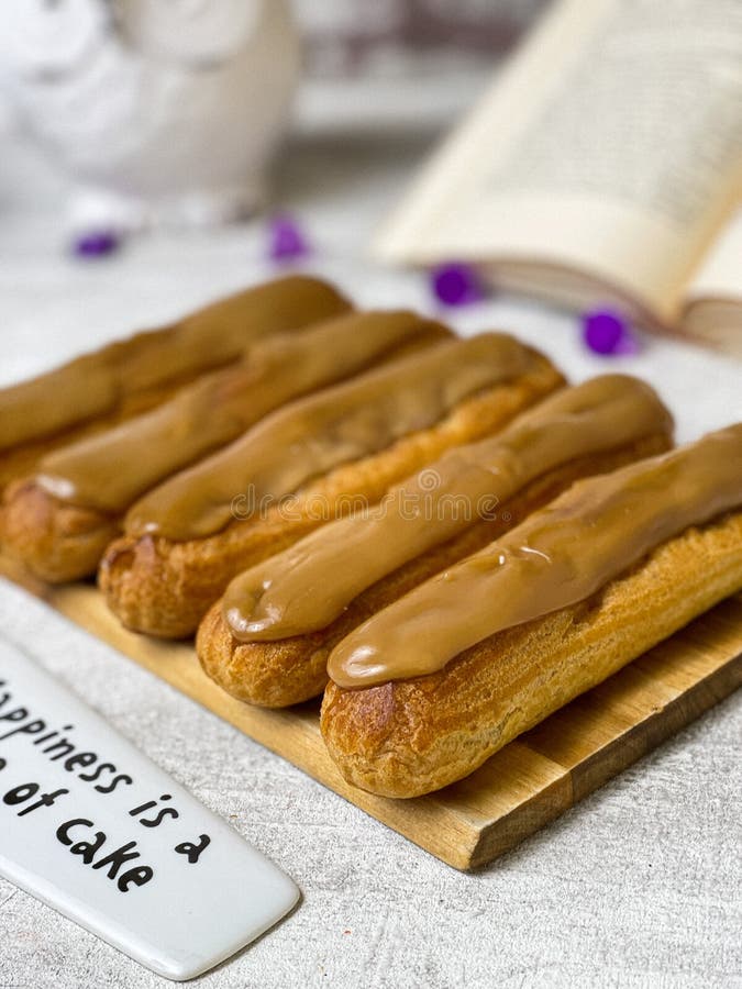 Eclairs stock image. Image of eclairs, cream, dessert - 248130085