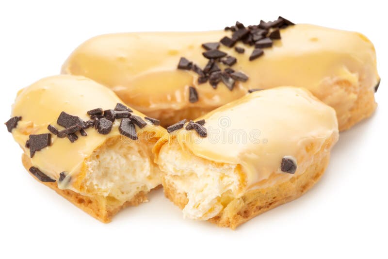 Eclairs with Filled Vanilla Cream and Covered with Chocolate Isolated ...