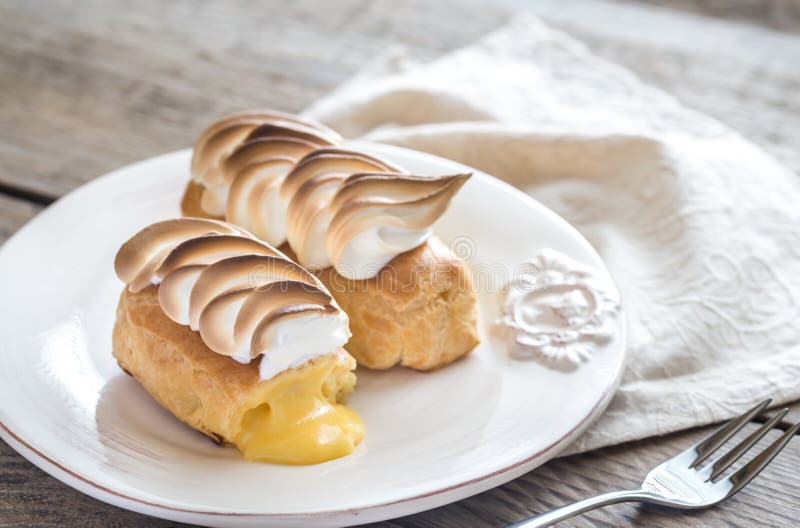 Eclairs with Lemon Curd and Meringue Stock Image - Image of bakery ...