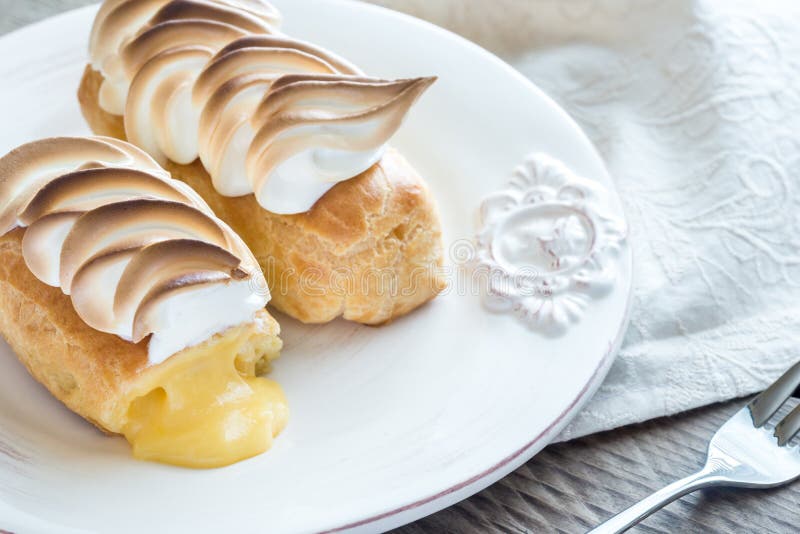 Eclairs with Lemon Curd and Meringue Stock Photo - Image of marmalade ...