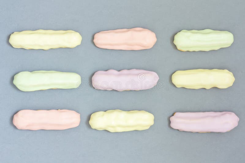 Eclairs with Pastel Color Icing Stock Photo - Image of creamy, frosting ...