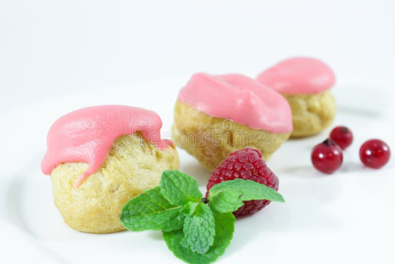 Eclairs with raspberries stock photo. Image of bakery - 88117702