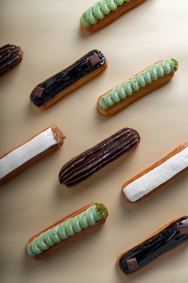 Eclairs Selection, Delicious Eclairs on Beige Background Stock Image ...