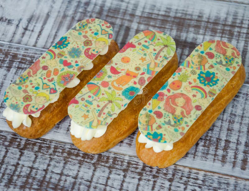 The Eclairs with Vanilla Cream Cheese Decorated with Chocolate Print ...