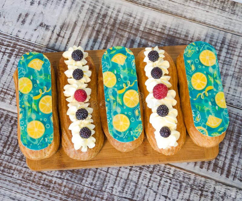 The Eclairs with Vanilla Cream Cheese Decorated with Chocolate Print ...