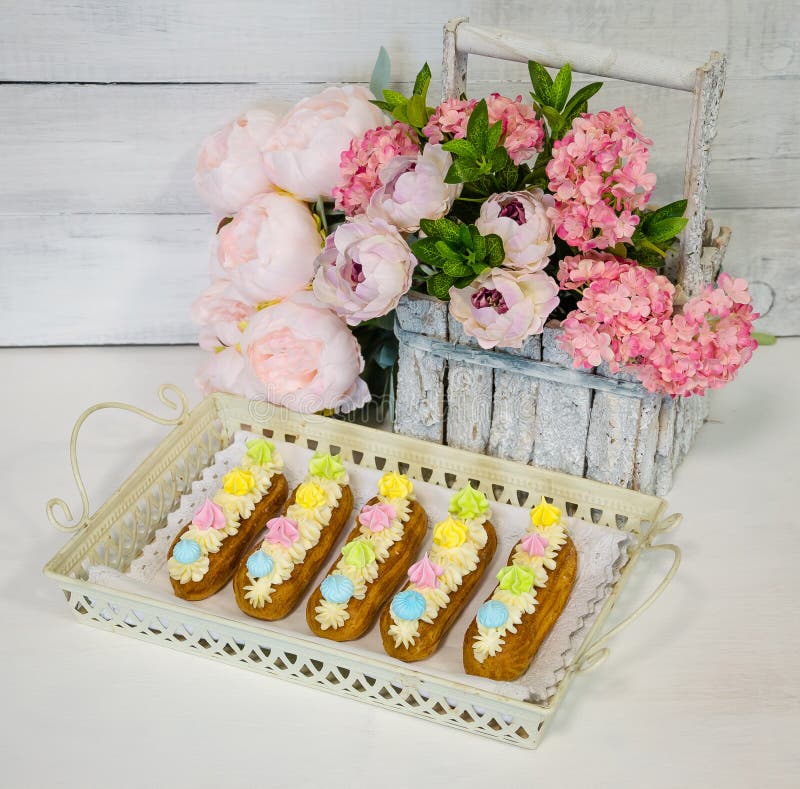 The Eclairs with Vanilla Cream Cheese Decorated with Merengues Stock ...