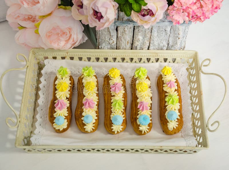 The Eclairs with Vanilla Cream Cheese Decorated with Merengues Stock ...