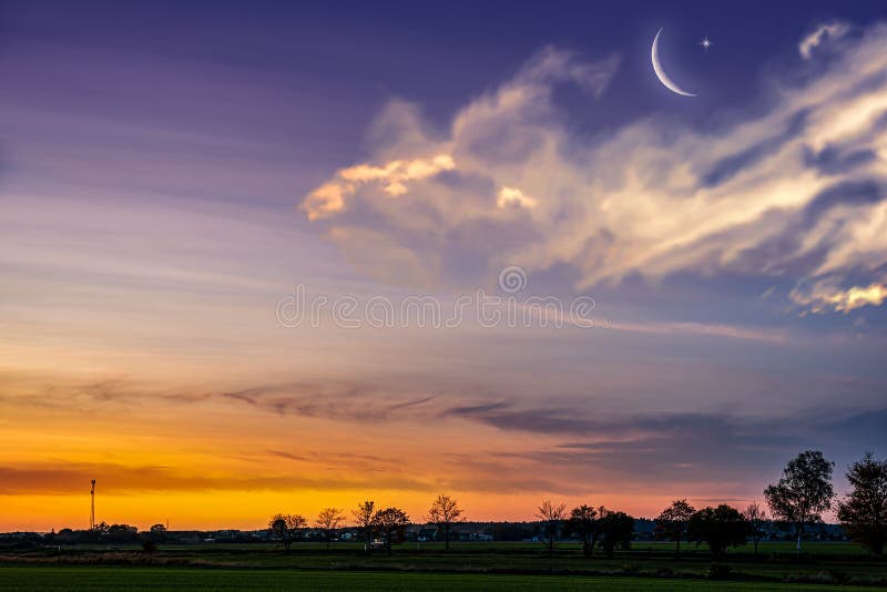 Moon in Bright Clouds of Sunset Sun . New Moon Stock Photo - Image of ...