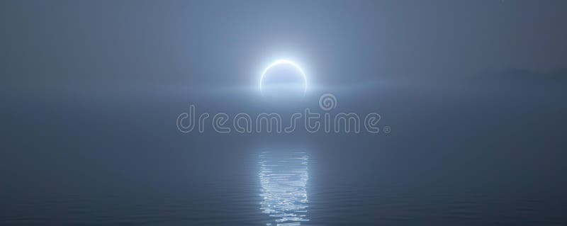 Eclipse Over Tranquil Water on a Misty Morning Stock Photo - Image of ...