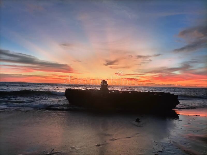 Eco beach Sunset bali stock photo. Image of sunset, rock - 263409186