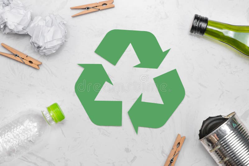 Eco Concept. Waste Recycling Symbol with Garbage on Stone Stock Photo ...