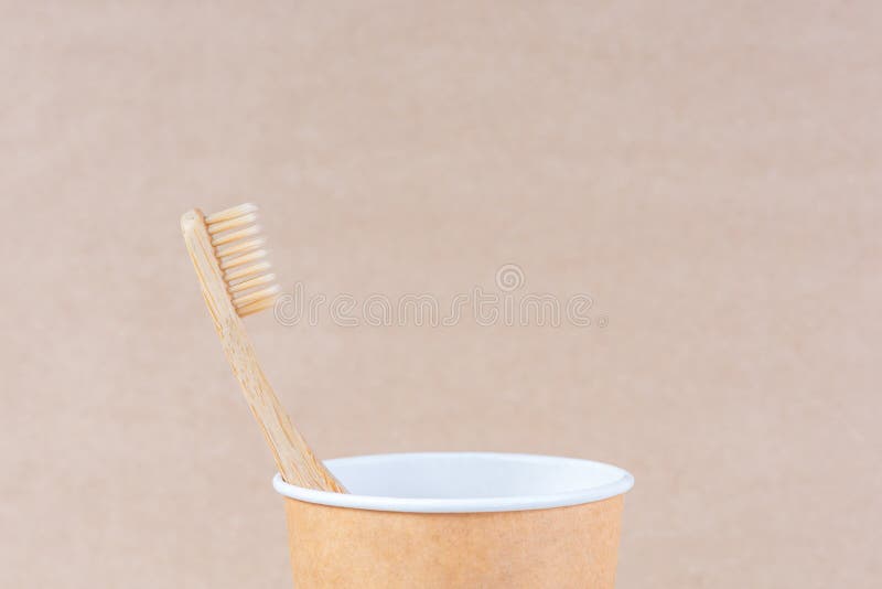 Eco Friendly Bamboo Toothbrush in Cup on Brown Background. Zero Waste ...