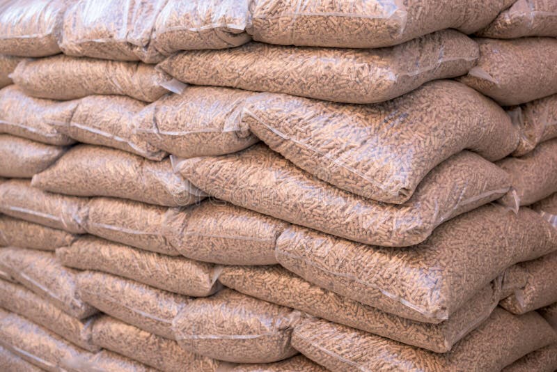 Eco pellets in bags stock image. Image of coniferous - 103716981