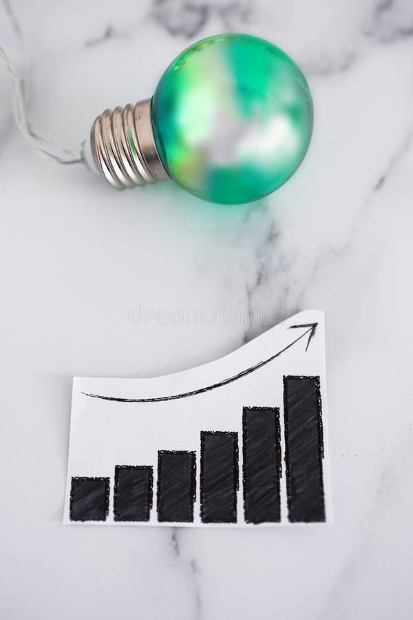 Ecology and Green Ideas for the Environment, Green Light Bulb Next To ...