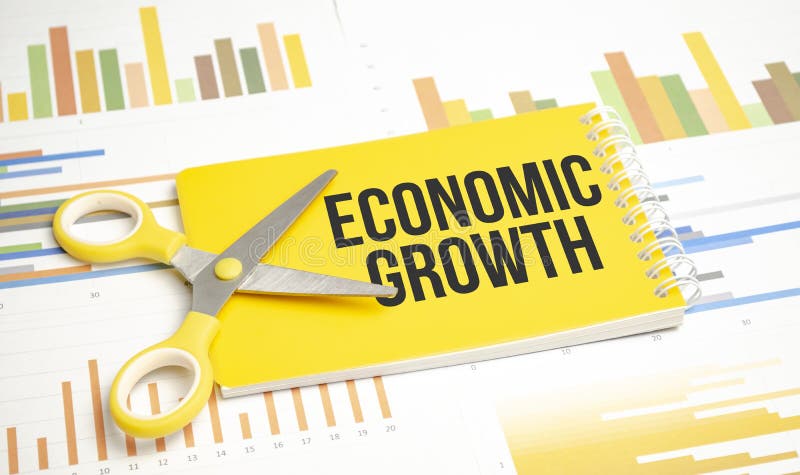 ECONOMIC GROWTH Text on Yellow Notebook and Charts Stock Image - Image ...