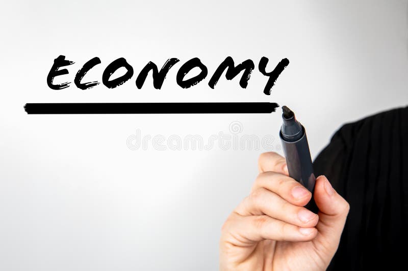 Economy Concept. Hand Writing Text with Marker on a White Background ...