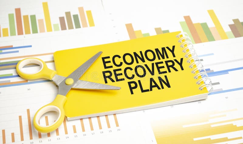 ECONOMY RECOVERY PLAN CONCEPT. Text on Yellow Notebook and Charts Stock ...
