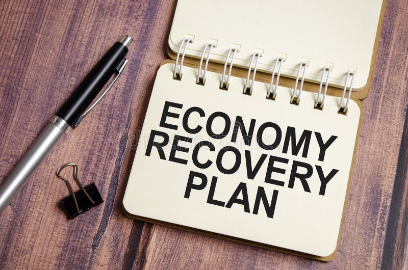 ECONOMY RECOVERY PLAN. Text on Business Notebook with Pen Stock Photo ...
