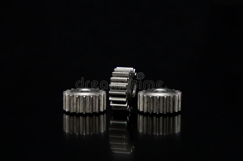 Ecorative Shot with Three Cogwheels on a Black Background. Stock Photo ...