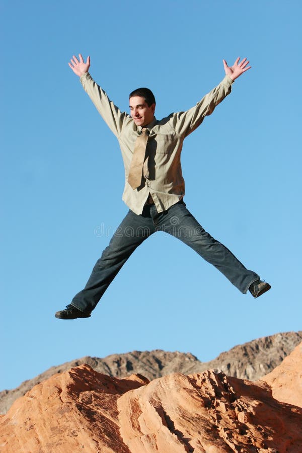 Ecstatic Businessman Jumping Stock Image - Image of ecstatic, serious ...