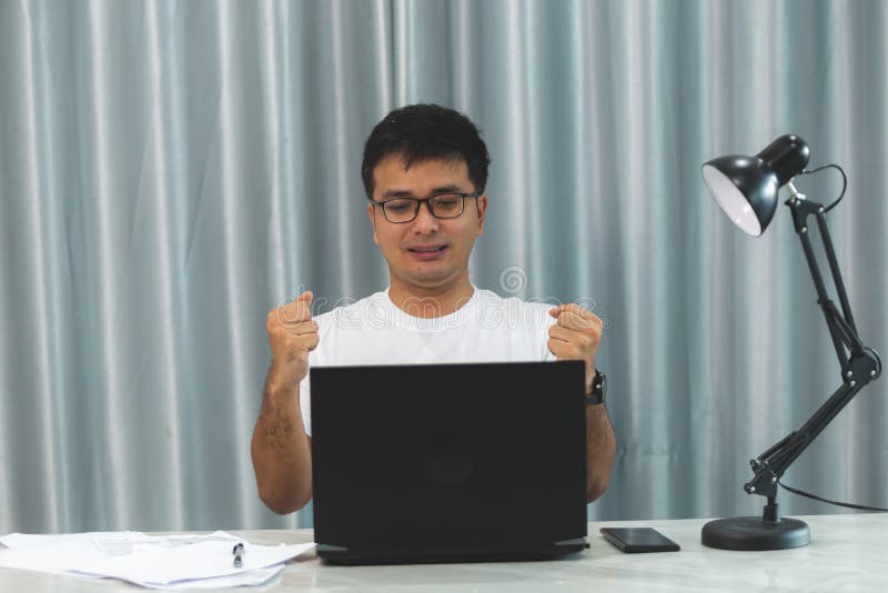 Asian Muslim Man Standing and Praying while Raised Arms on the Dune ...