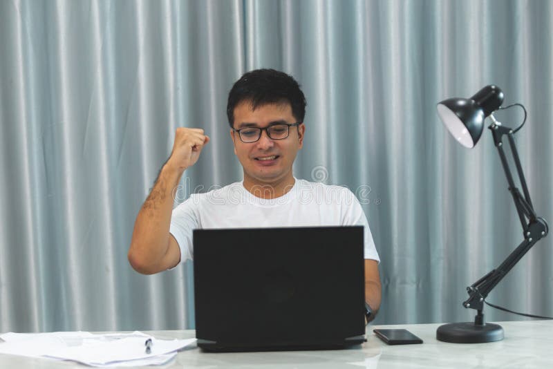 Asian Muslim Man Standing and Praying while Raised Arms on the Dune ...