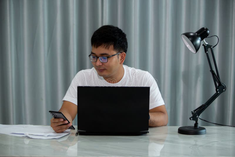 Asian Muslim Man Standing and Praying while Raised Arms on the Dune ...