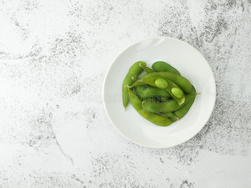 Edamame Beans in Dish Isolated on White Background. Green Soybeans ...