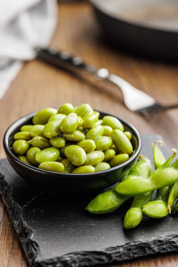Edamame Soy Beans in Bowl on Wooden Table Stock Image - Image of snack ...