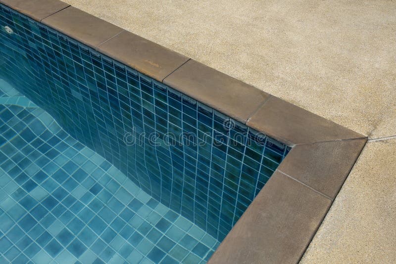 Edge of swimming pool stock photo. Image of beautiful - 159513922