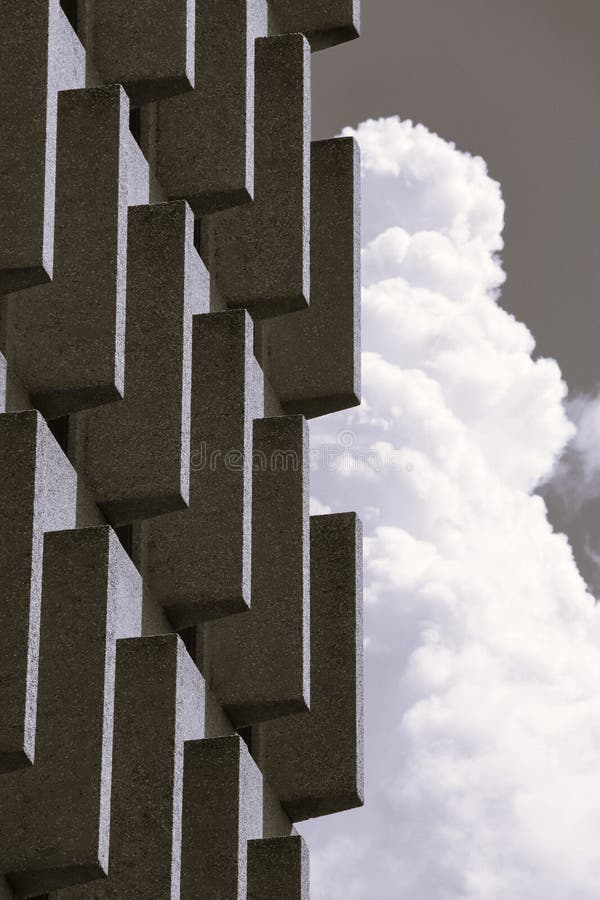 Edge of Gray Rectangle Slab Building Against Puffy White Clouds Stock ...
