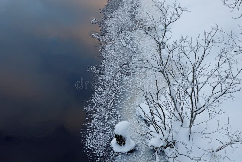 Edge of Ice in the Water with Reflections Stock Image - Image of frost ...