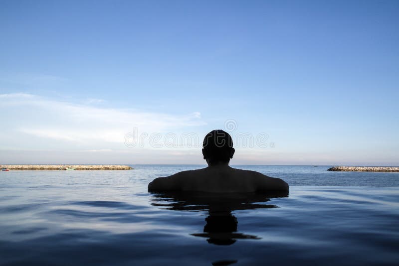 Edge of Infinity Swimming Pool Editorial Photo - Image of romantic ...