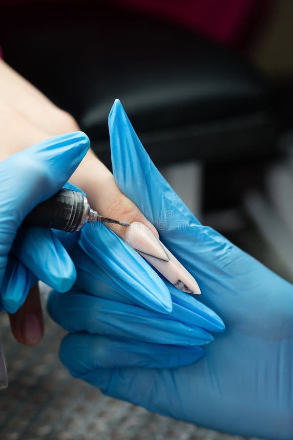 EDGE Nail Shaping stock photo. Image of precision, manicure - 305554732