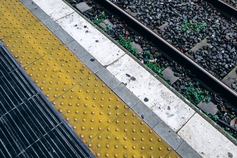 Edge of the Platform and Yellow Line at the Train Station Stock Photo ...