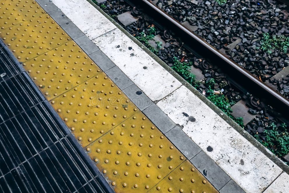 Edge of the Platform and Yellow Line at the Train Station Stock Image ...