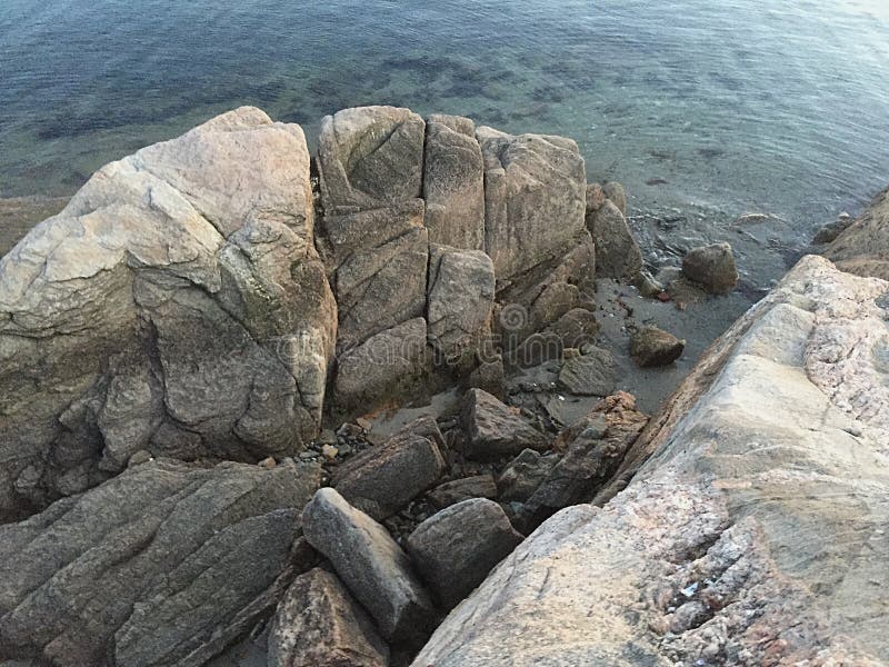 Edge of the Rocks stock photo. Image of rocks, waters - 113264590