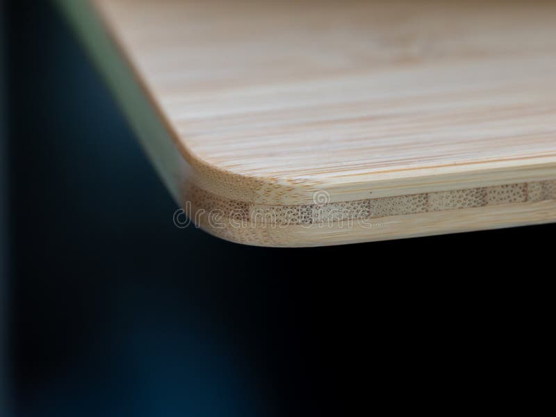 Edge of Rounded Plywood As Table Board, Dark Background Stock Photo ...