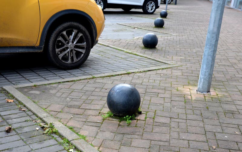 The Edge of the Sidewalk Formed by Concrete Bollards in the Shape ...