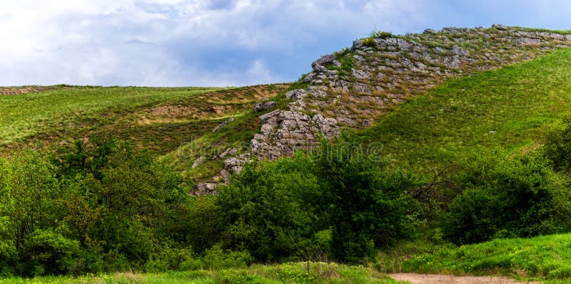 Edge of Steep Slope on Rocky Hillside. Dramatic Scenery in Mountain ...