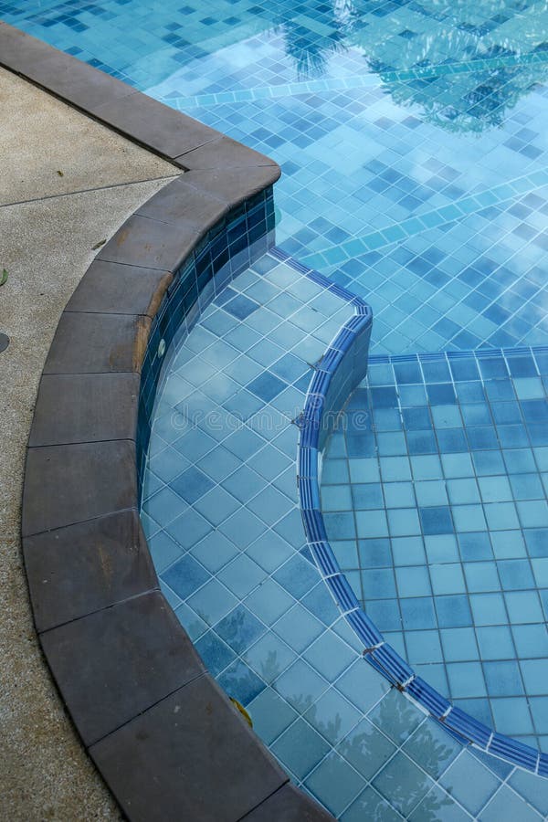 Edge of swimming pool stock photo. Image of beautiful - 159513922
