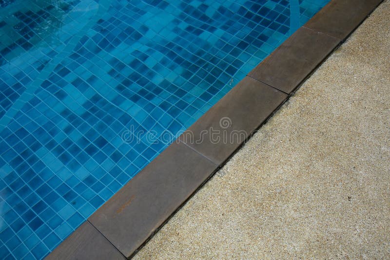 Edge of swimming pool stock image. Image of calm, blue - 141743189